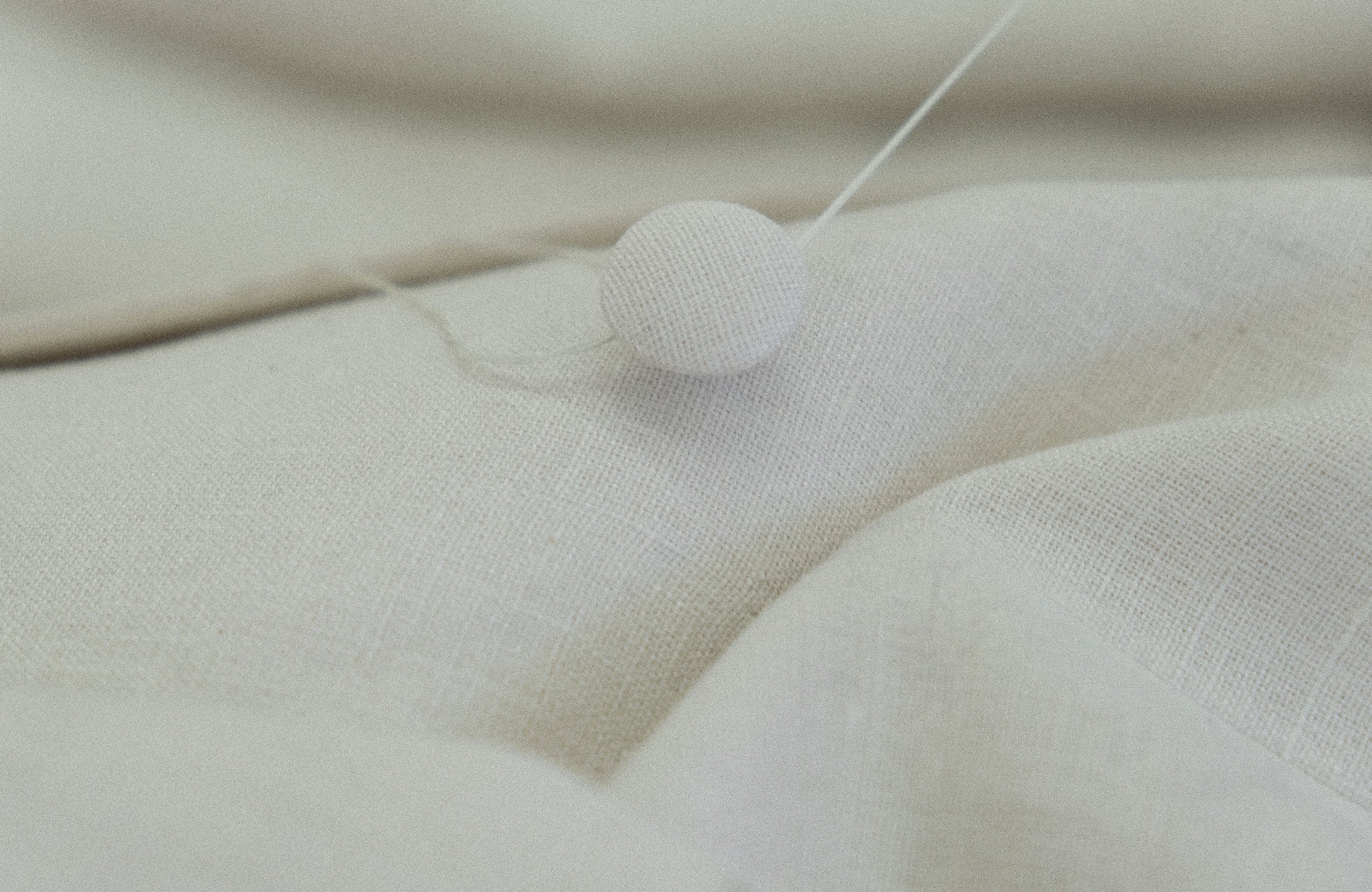 Hand sewing a shank button – SUITED ATELIER